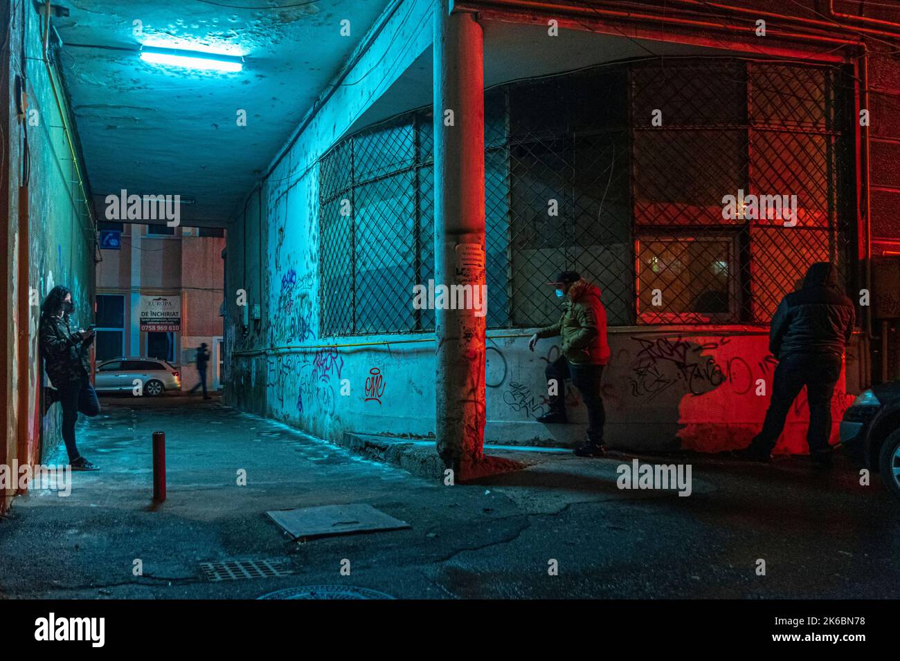 A gang of boys behind the alley Stock Photo - Alamy