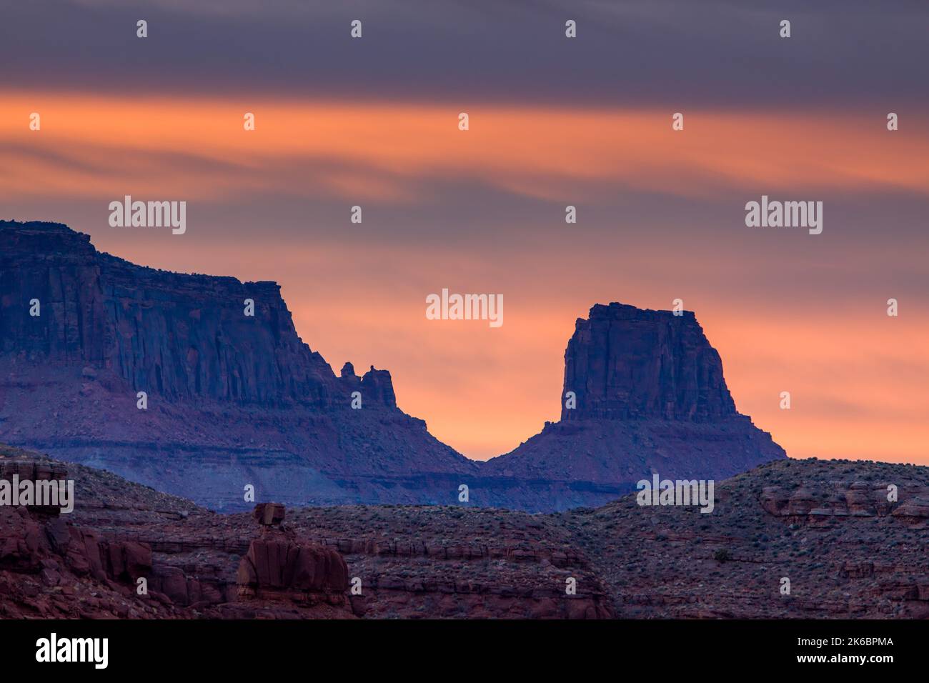 Pastel clouds over Hatch Point at sunrise in the Canyon Rims Recreation ...