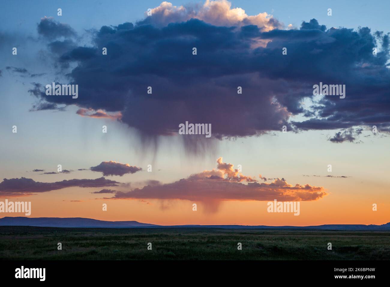 Virga under the clouds on the prairie in Wyoming. Virga is falling rain ...