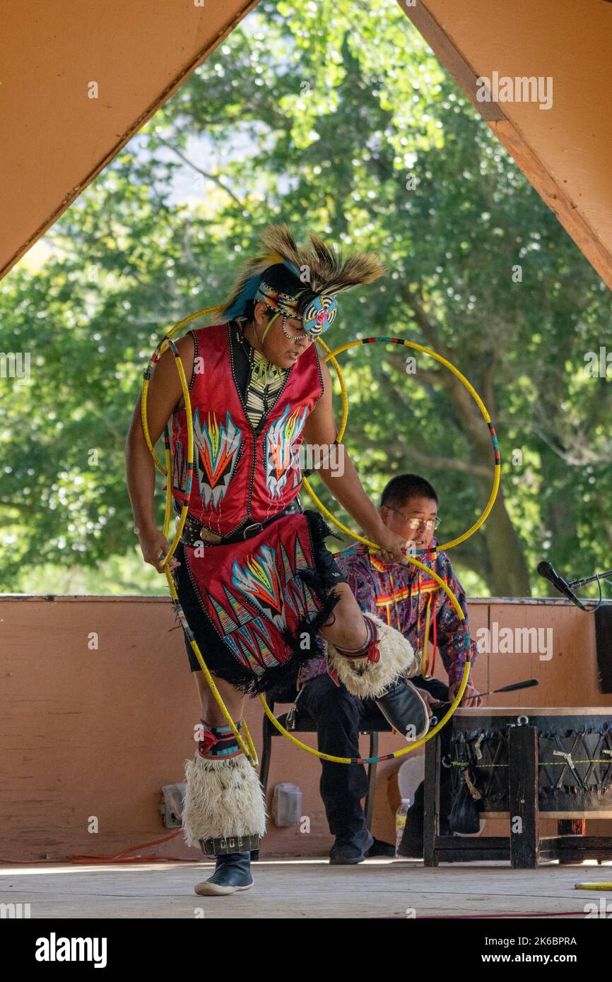 Navajo Native American hoop dancer in regalia performing at a festival ...