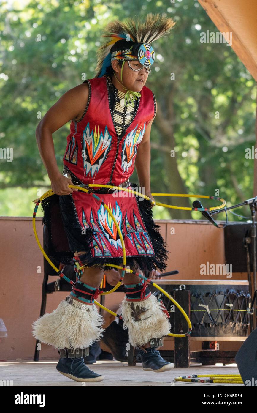 Navajo Native American hoop dancer in regalia performing at a festival ...