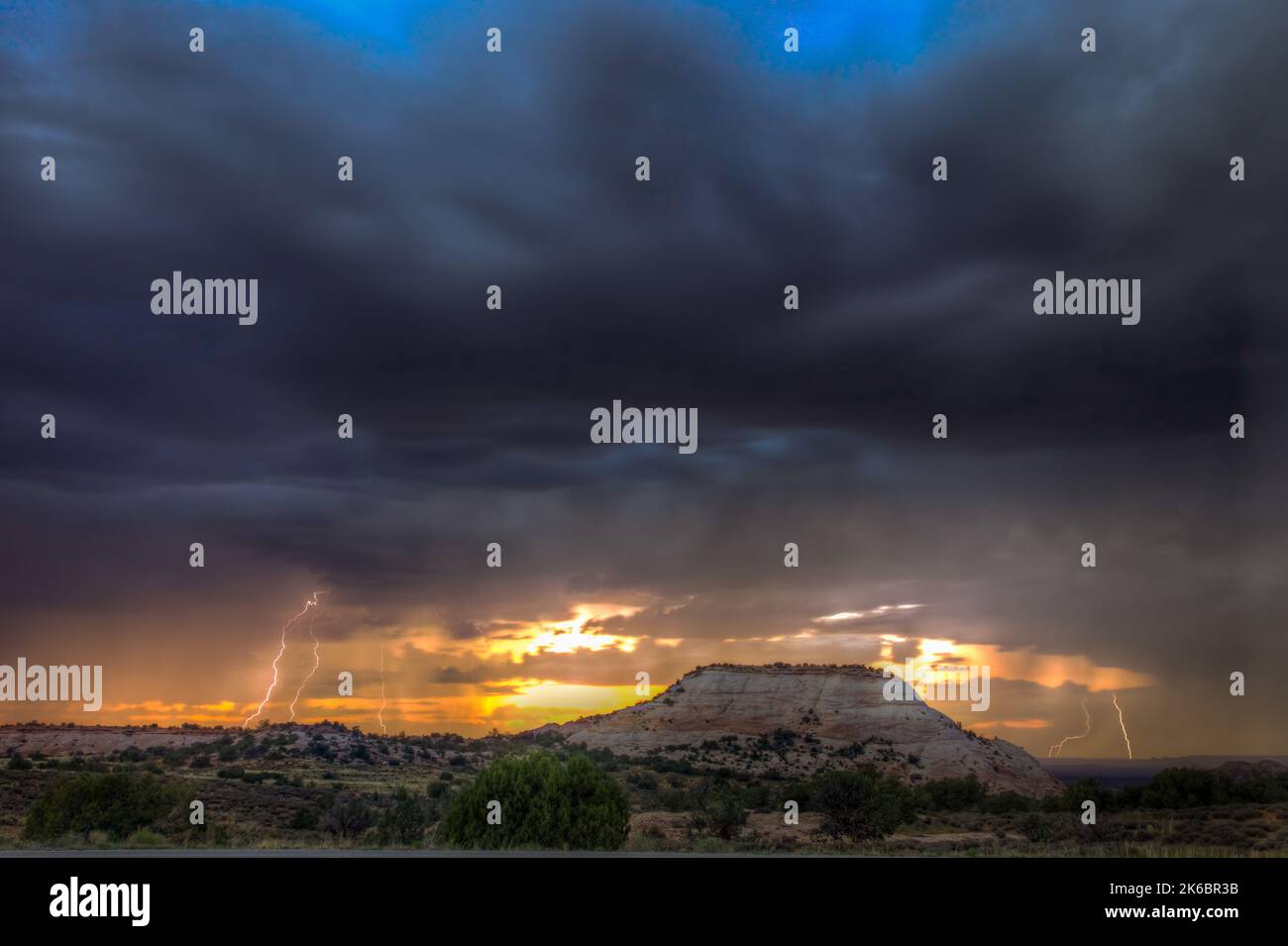 Thunderstorm with lightning over Aztec Butte in the Island in the Sky ...
