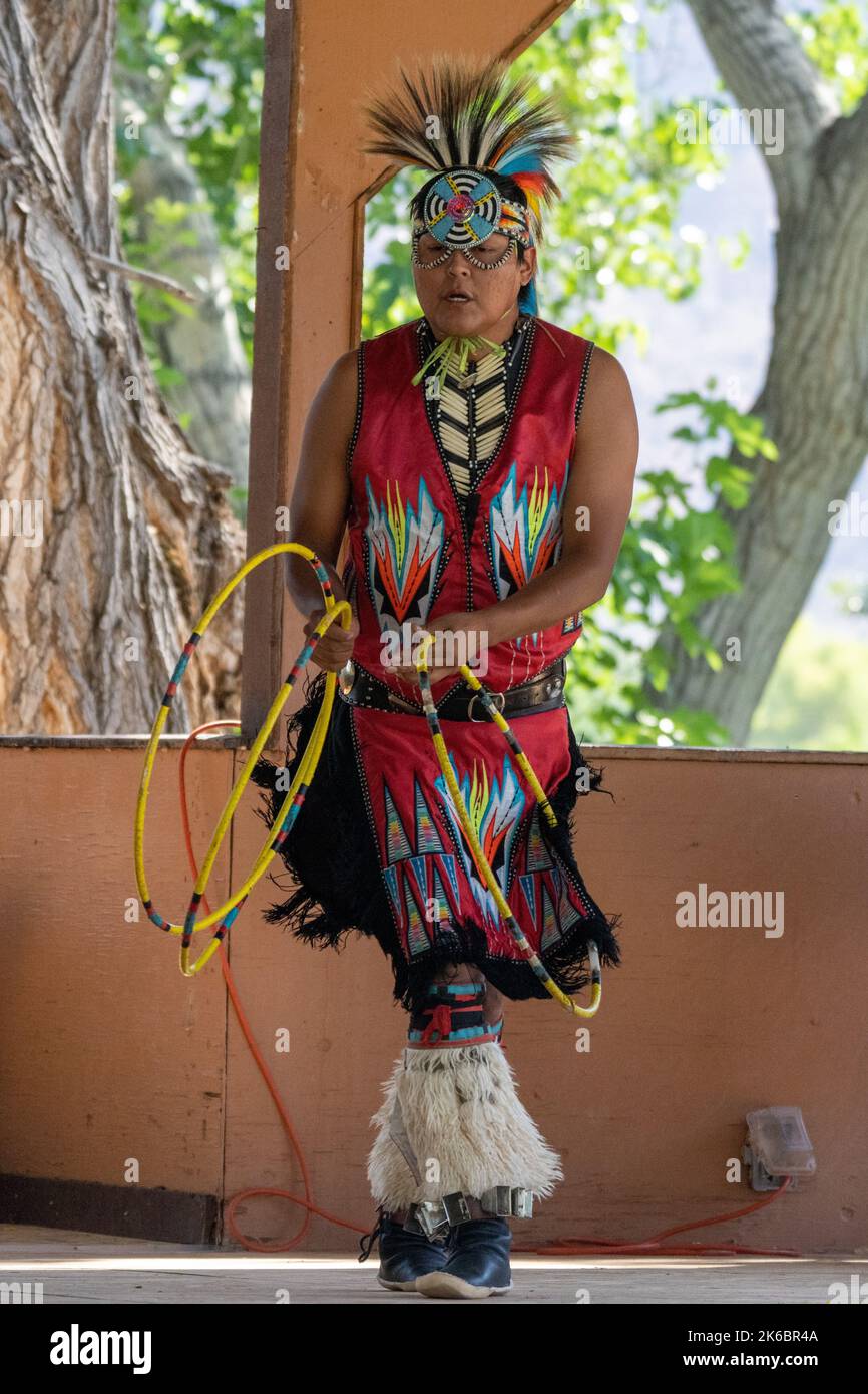 Navajo Native American hoop dancer in regalia performing at a festival ...