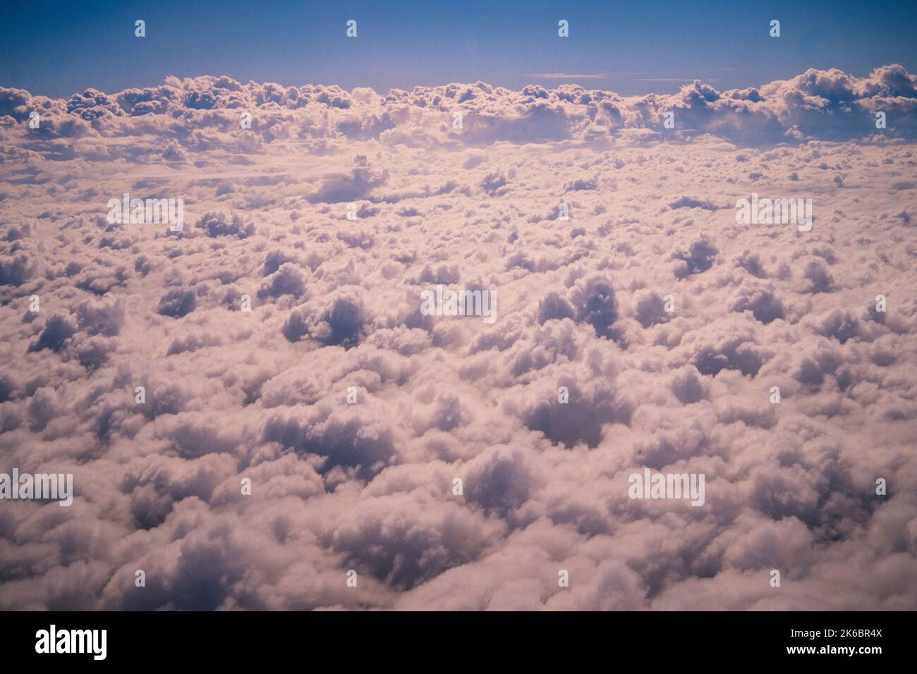The tops of cumulonimbus clouds taken while flying over the Amazon ...