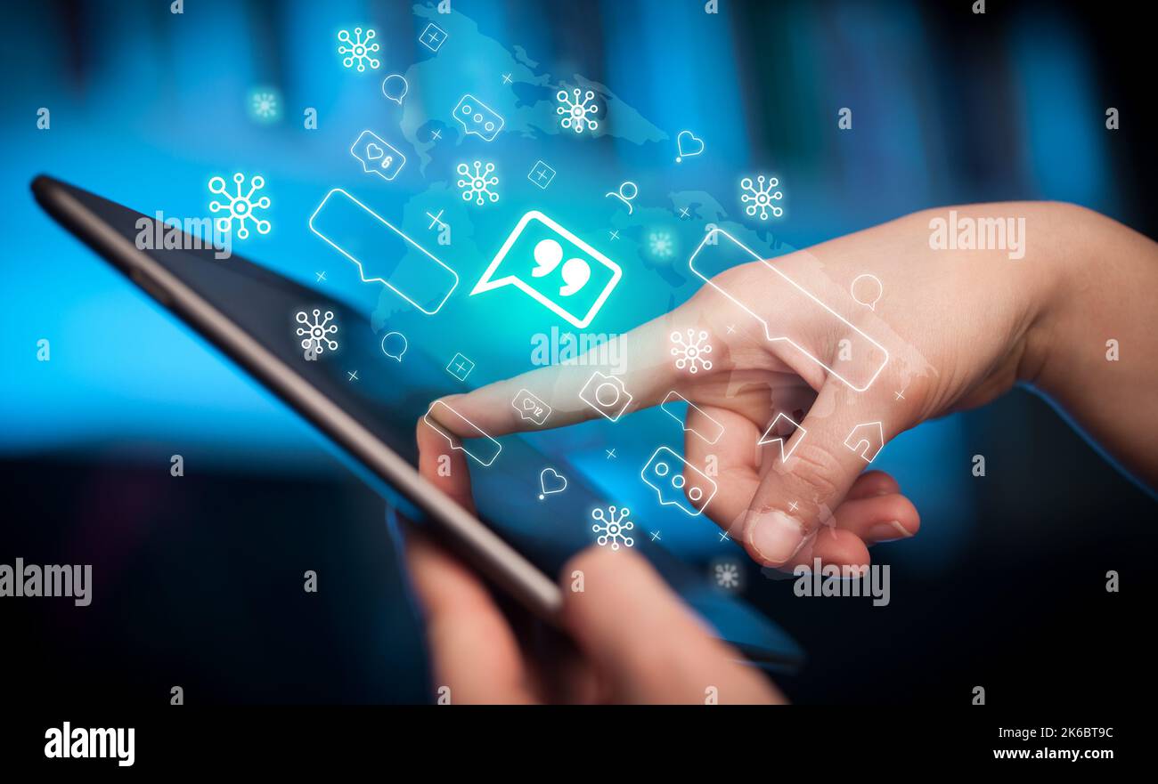 Close-up of a hand using tablet, social media concept Stock Photo - Alamy