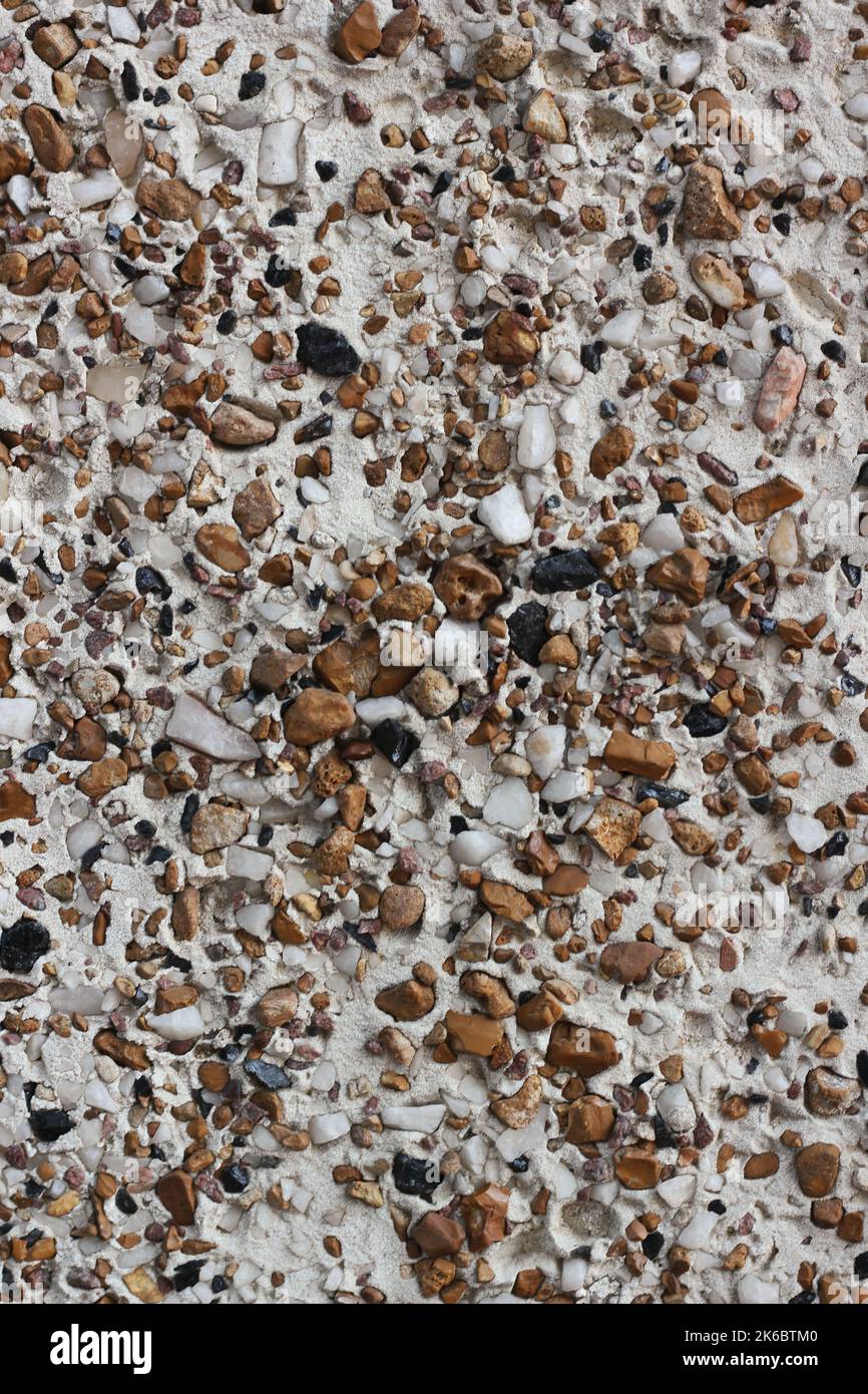 Crushed rock wall surface building detail Stock Photo - Alamy