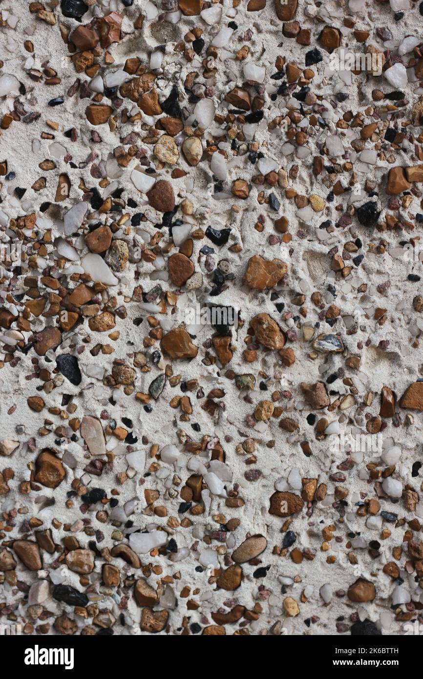 Crushed rock wall surface building detail Stock Photo - Alamy