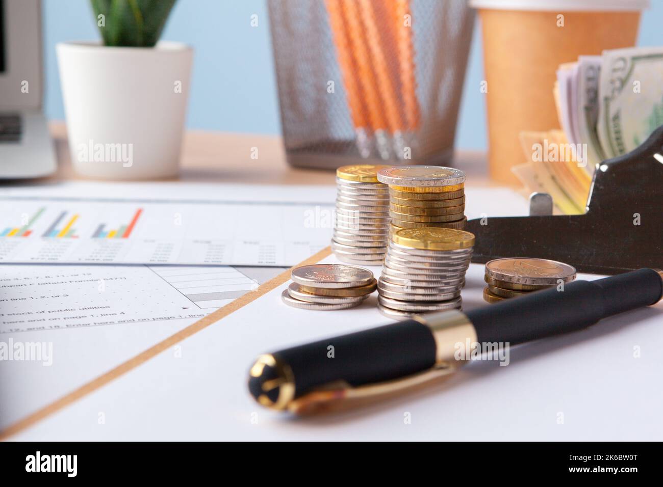 Saving stack coins money concept. Graph, chart document close up Stock ...