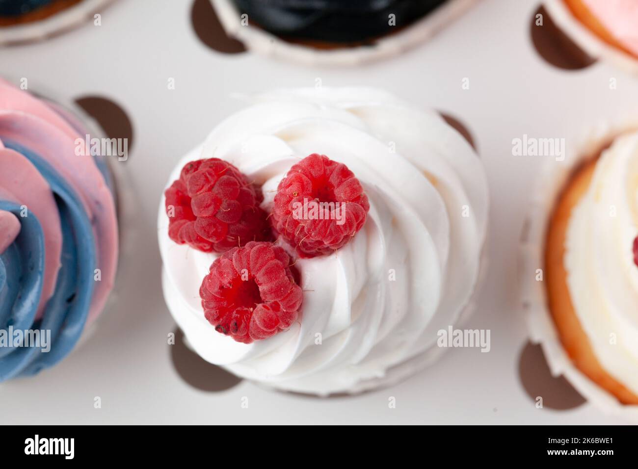 Homemade cupcakes traditional American sweet baked dessert with berries ...