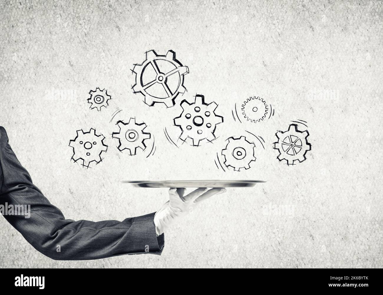 Waiter hand with empty silver tray and drawn gears concept Stock Photo ...
