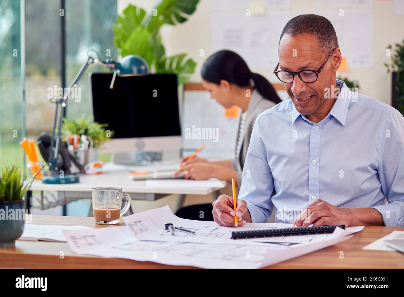 Happy mature architects in hi-res stock photography and images - Alamy