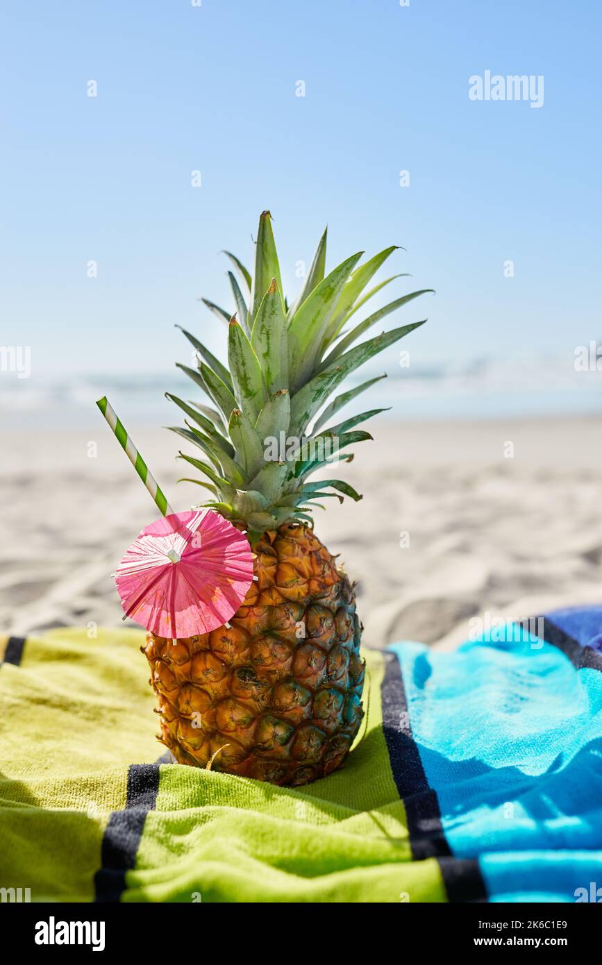 Pina Coladas on the beach are all you need. a pineapple cocktail on the ...