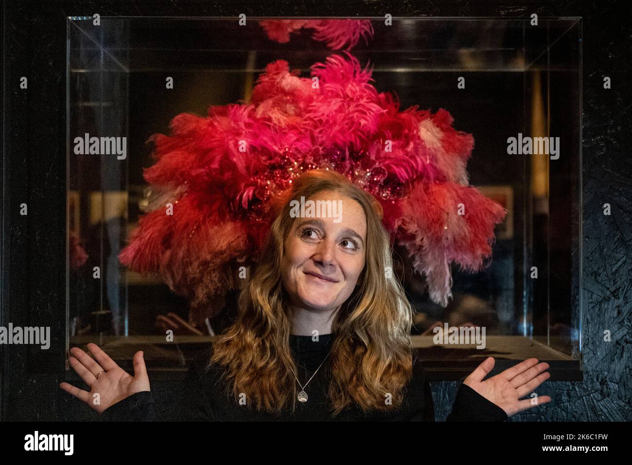 London, UK. 13 October 2022. A staff member with 'Costume design for ...