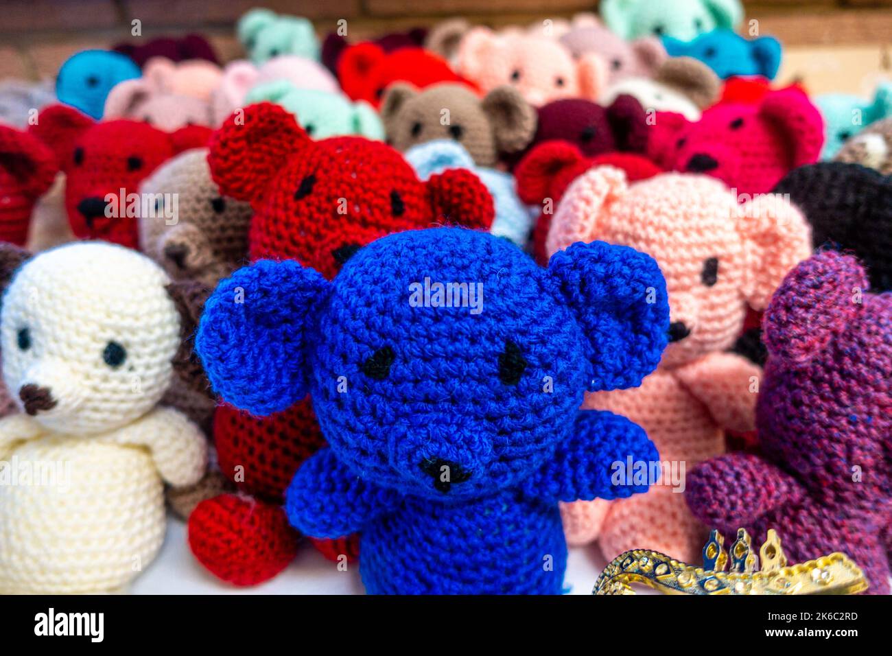 Knitted teddy bears in colourful colours ready to give out as gifts to ...