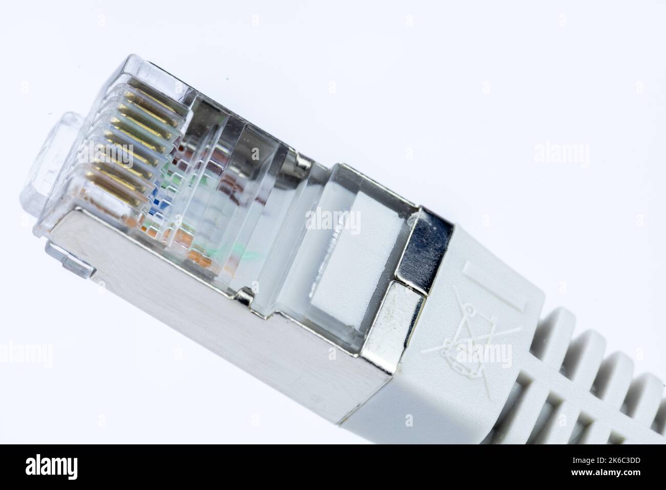 A network cable RJ45 isolated on white background Stock Photo - Alamy