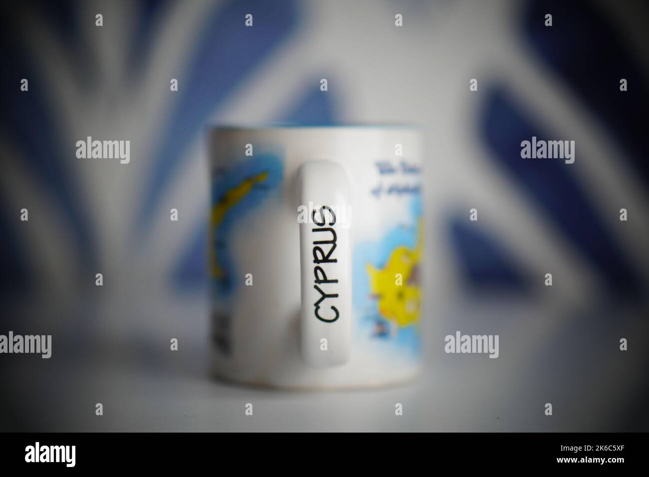 A small Cyprus souvenir coffee cup on a white table Stock Photo - Alamy