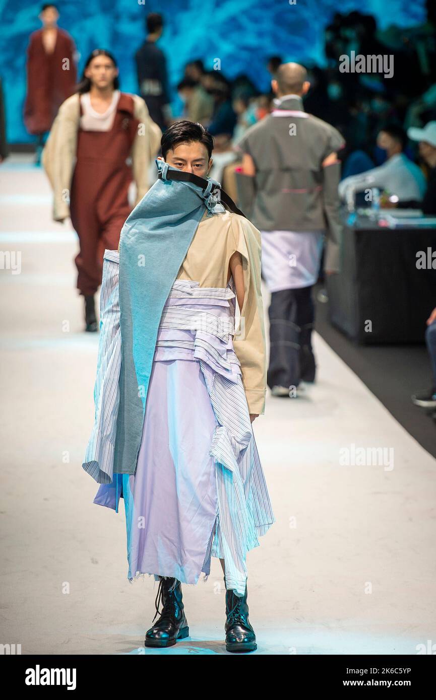 Taipei. 13th Oct, 2022. The models present creations by Shih Chung Yu ...