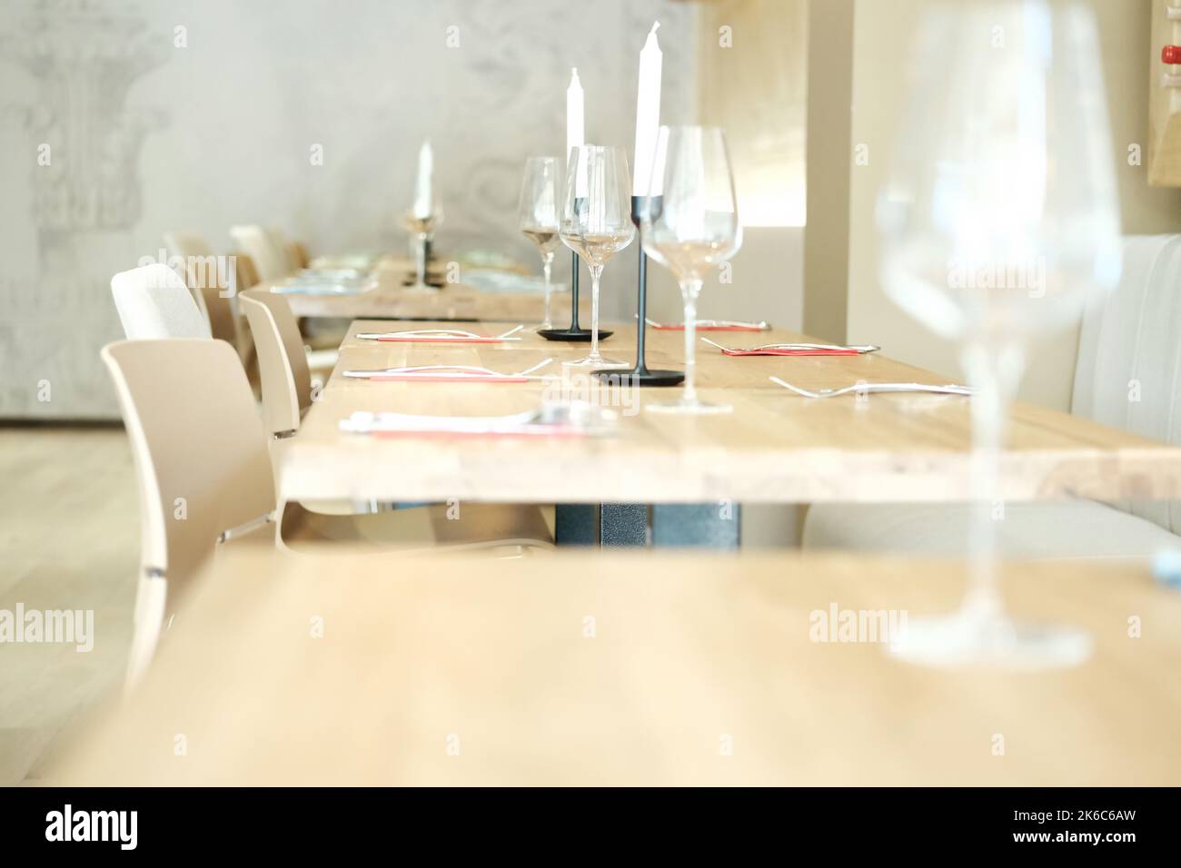 The beautiful arranged dinner tables at a restaurant Stock Photo - Alamy