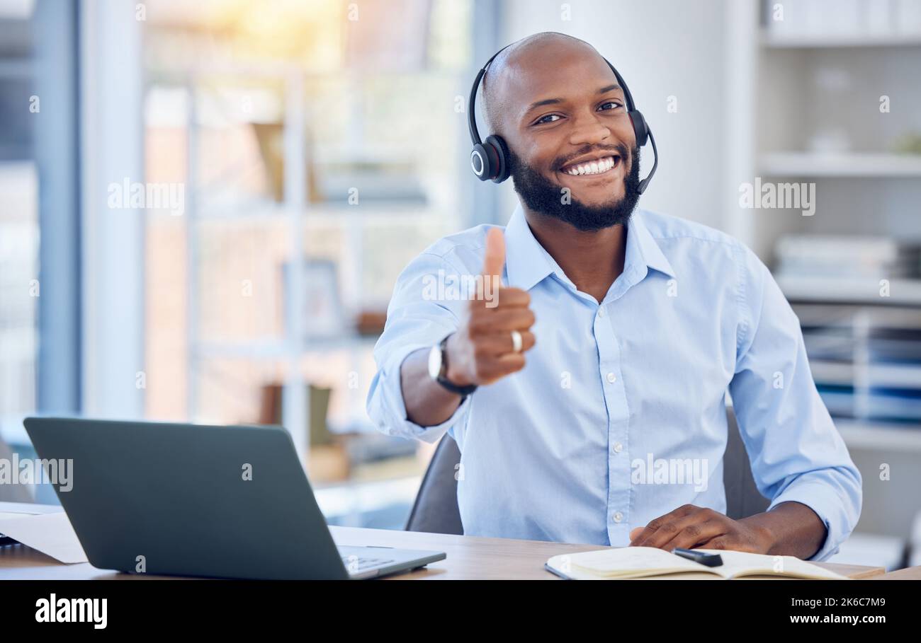 Thumbs up young man headset hi-res stock photography and images - Alamy