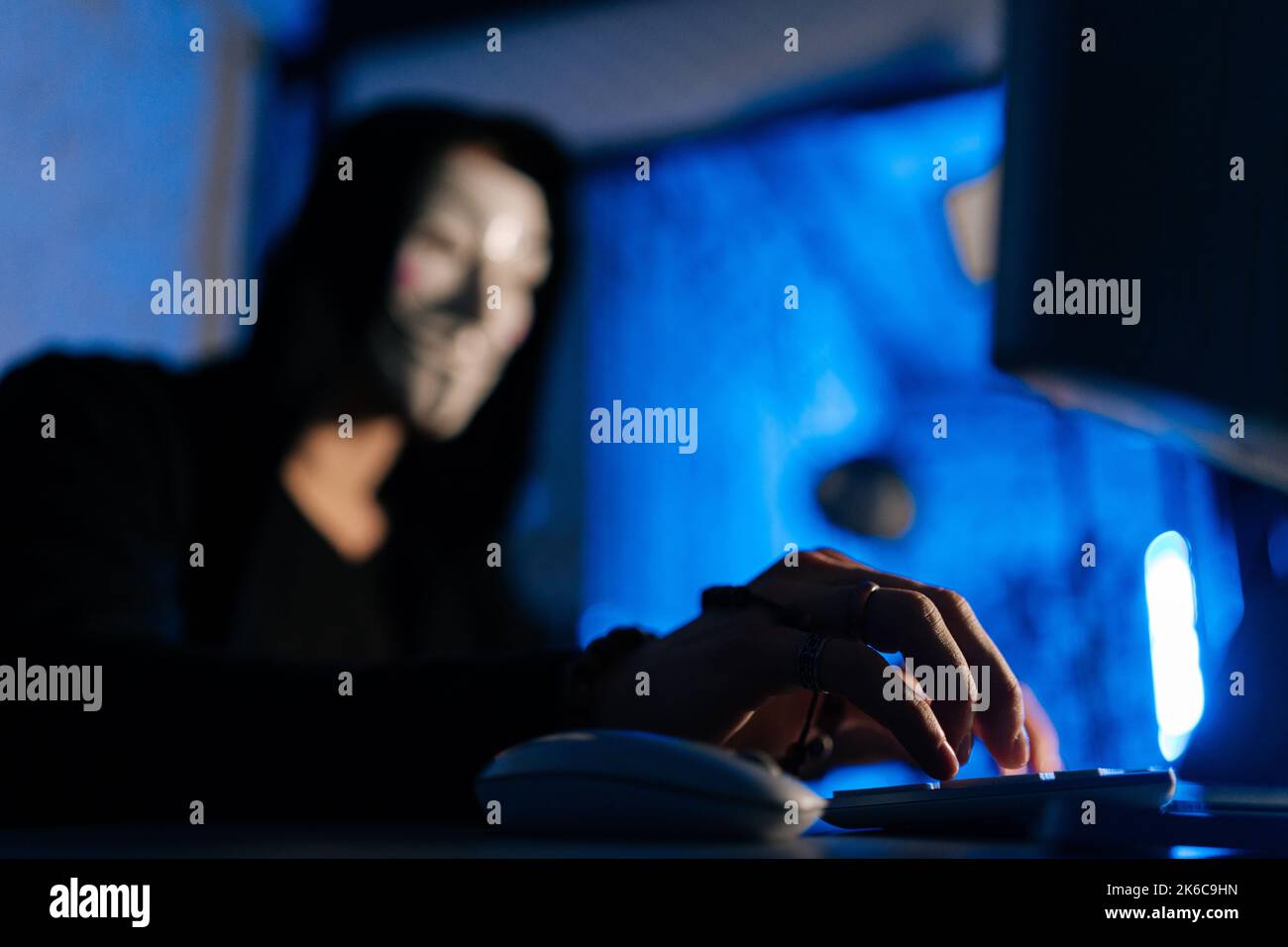Man wearing anonymous mask hi-res stock photography and images - Alamy
