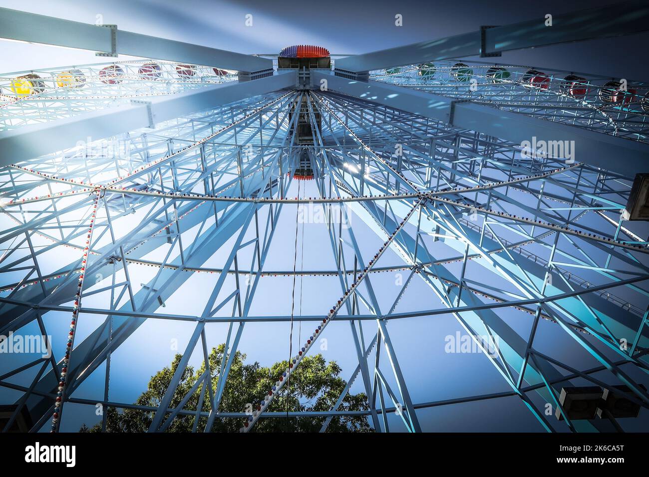 A low angle shot of a blue Ferris wheel at state fair in Texas Stock ...