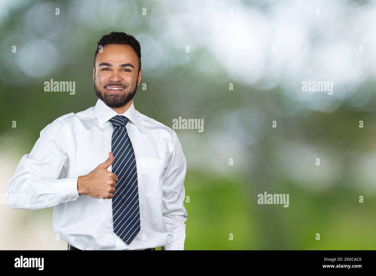 Happy young cool black man celebrating, OK sign Stock Photo - Alamy