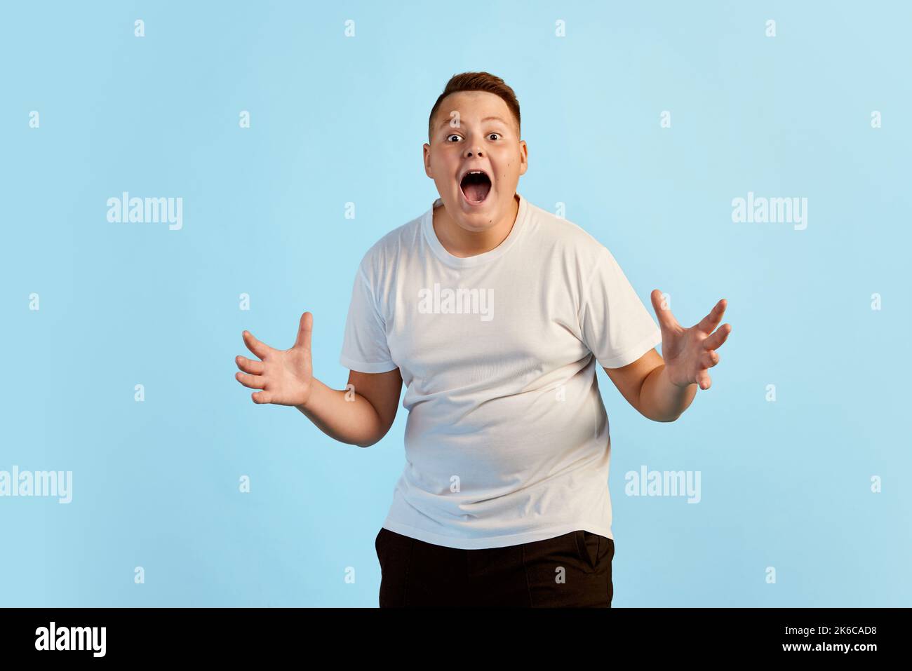 Overweight and teen and boy and eating hi-res stock photography and ...