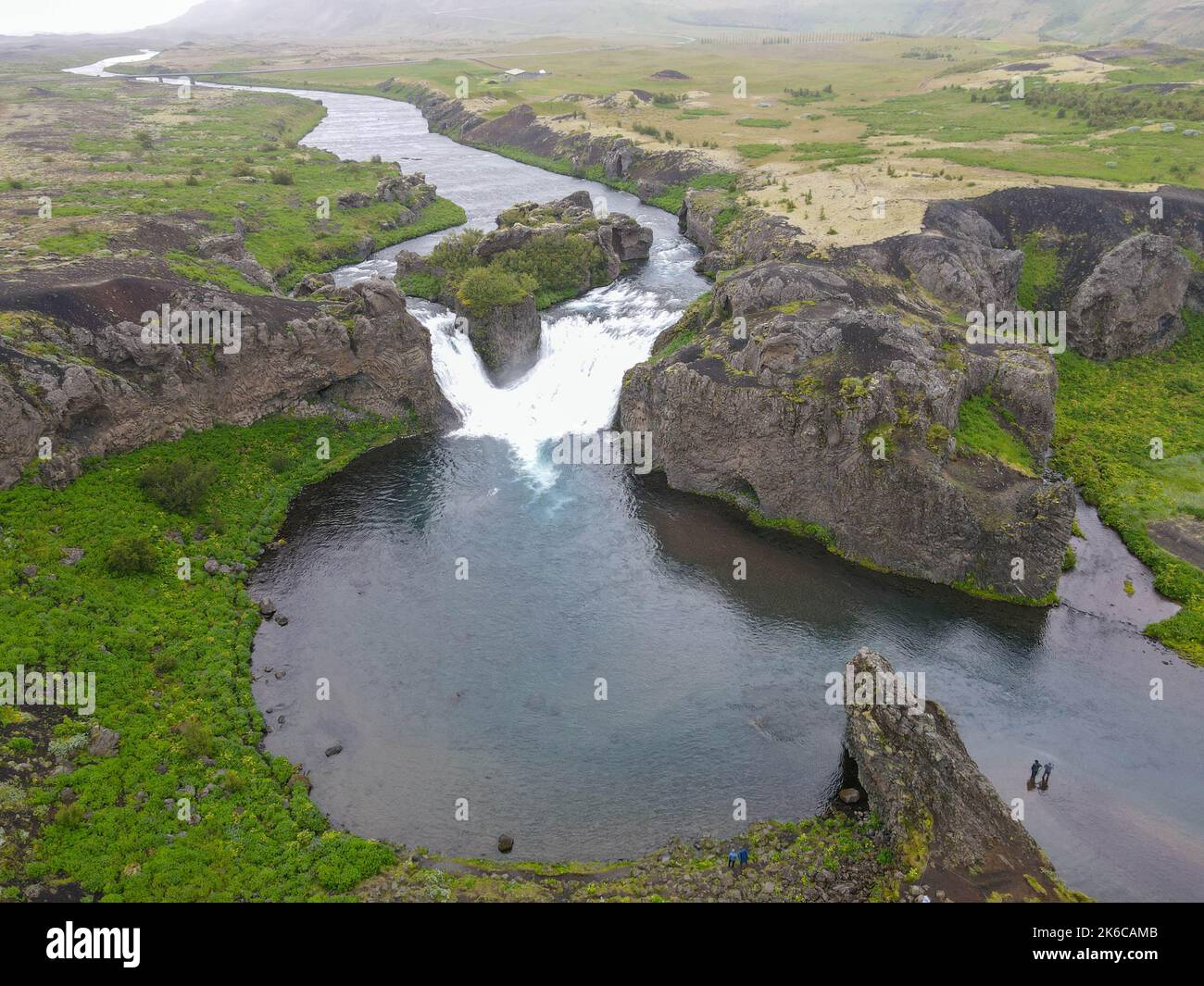 Drone view at Hjalparfoss waterfall on Iceland Stock Photo - Alamy