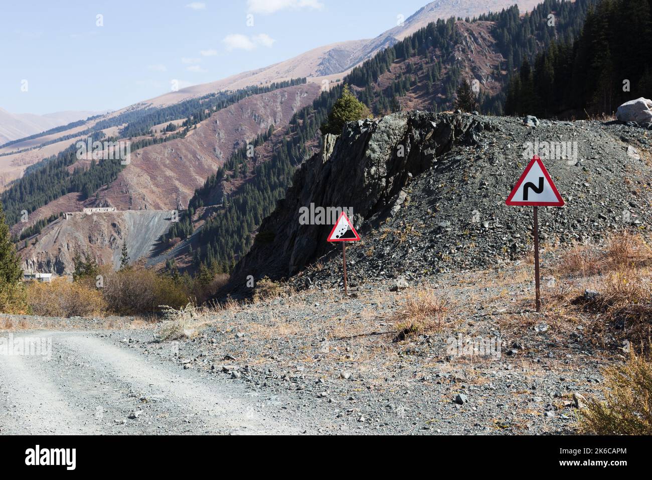 Road sign on a dangerous mountain Stock Photo - Alamy