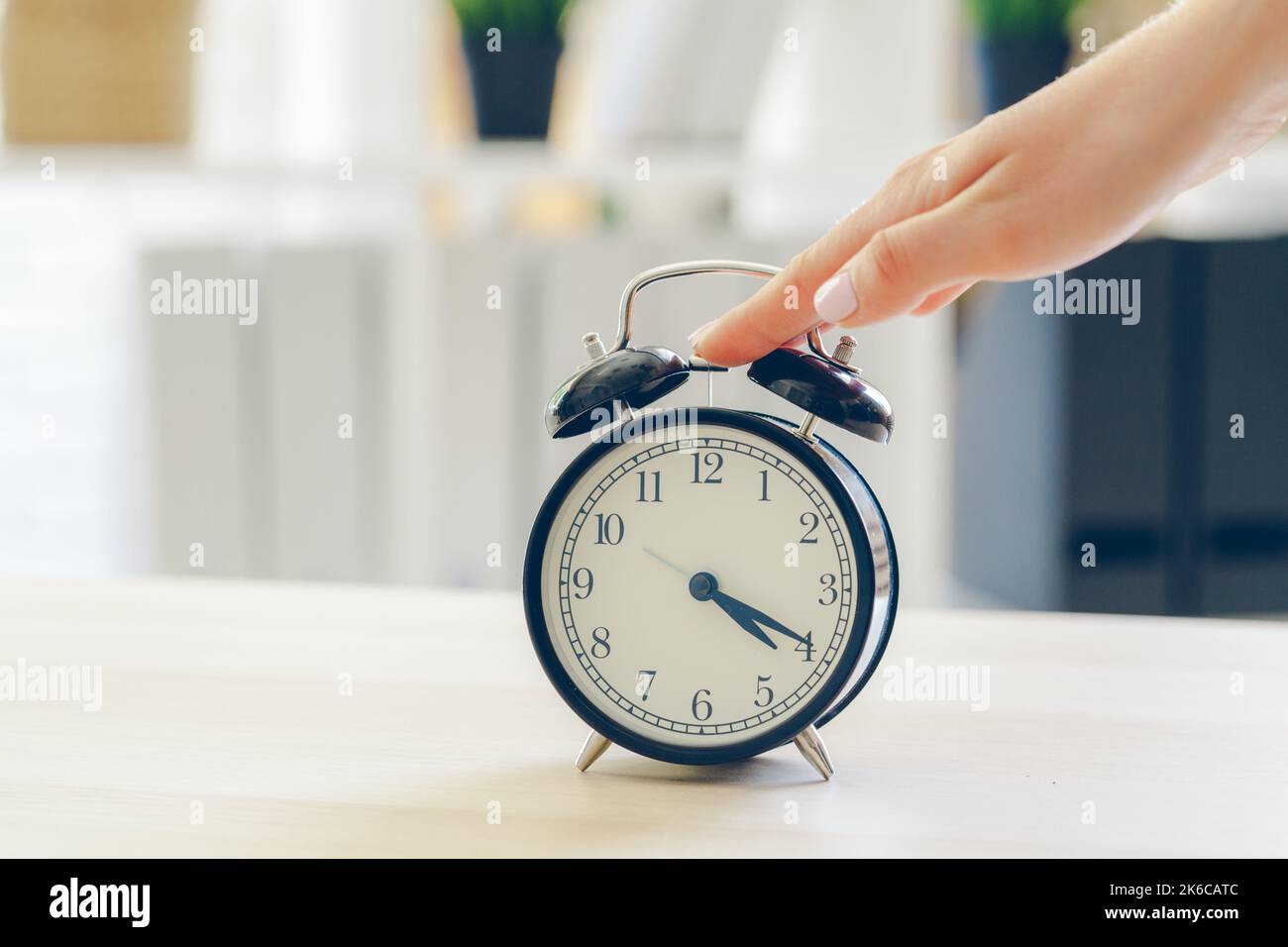 Man alarm clock switch off hi-res stock photography and images - Alamy