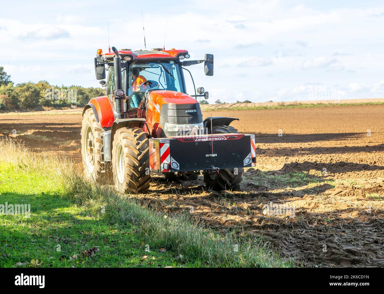 CASE 220 red tractor ploughing field, Suffolk Sandlings, Suffolk ...