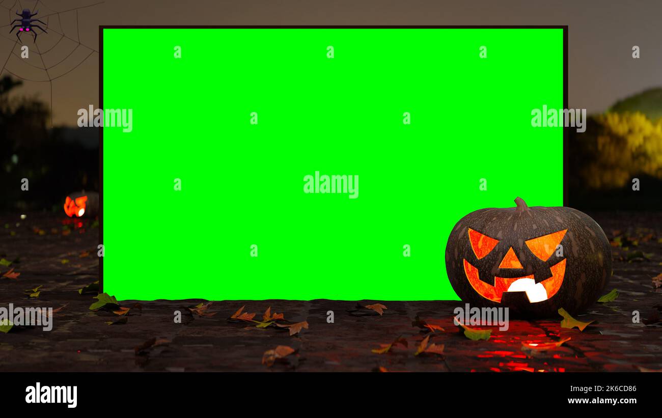 Scary, Cute, Halloween Card with carved Pumpkin in front of green ...