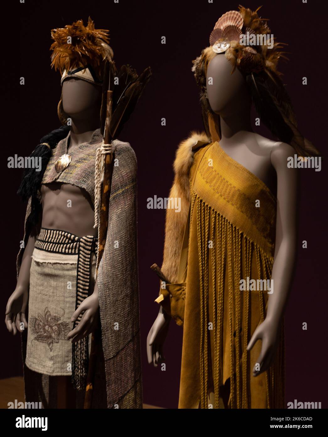 A couple of mannequins in traditional western Indian outfits in a ...