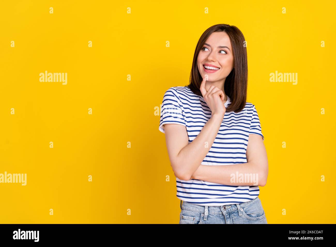 Photo of cute minded girl wear striped outfit arm finger touch face ...