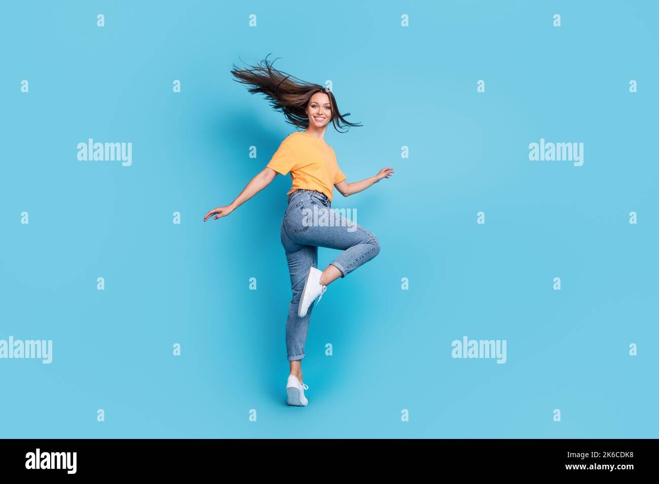 Full length photo of pretty sweet girl dressed yellow t-shirt dancing ...