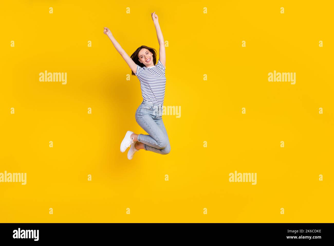Full size photo of active young lady raise fists celebrate win lottery ...