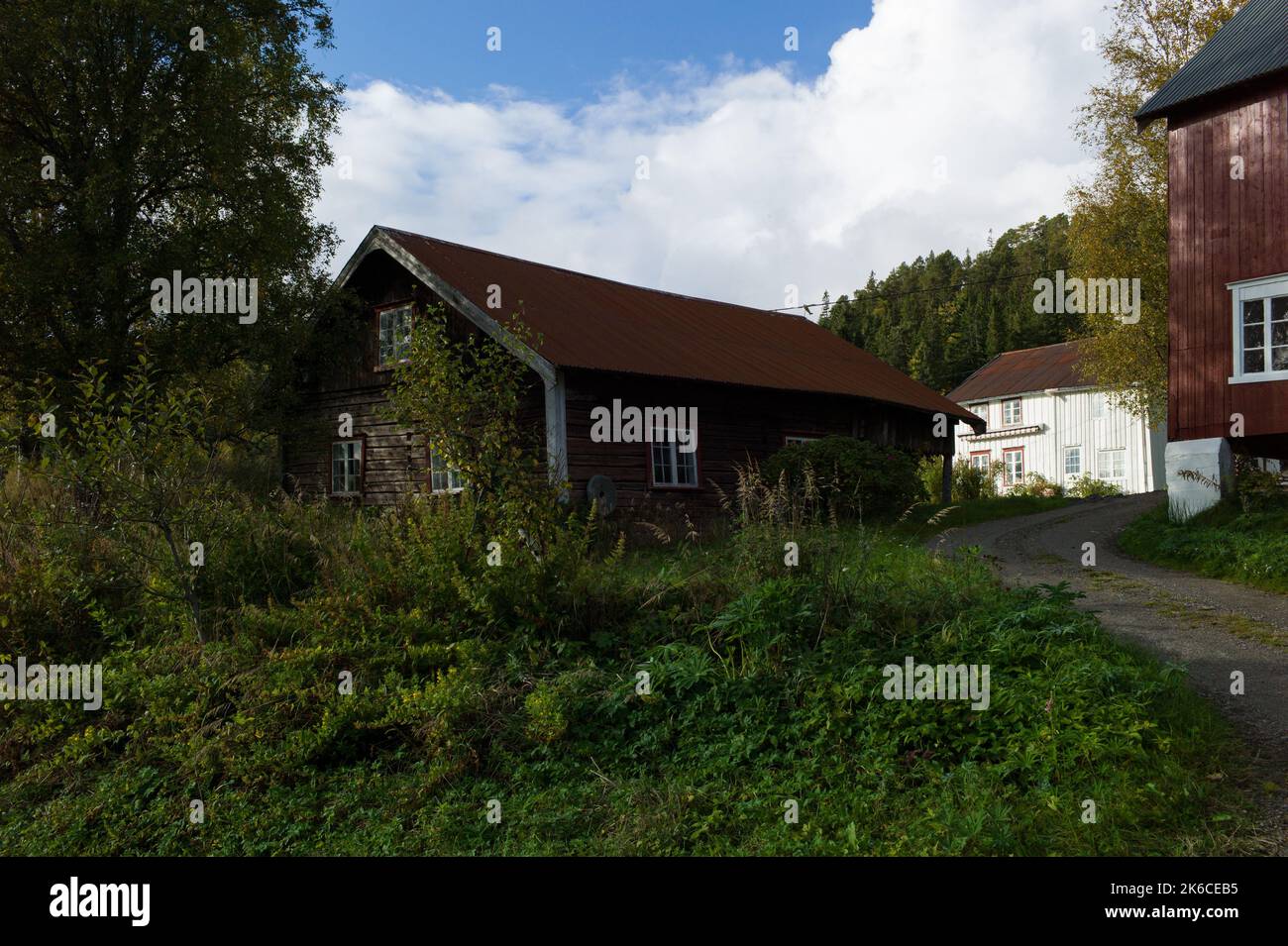 Wooden barn in traditional design in rural setting Stock Photo - Alamy