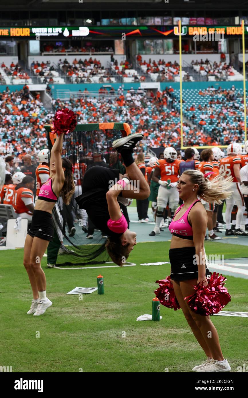 Miami Hurricanes cheerleaders perform flips at Hard Rock Stadium on ...