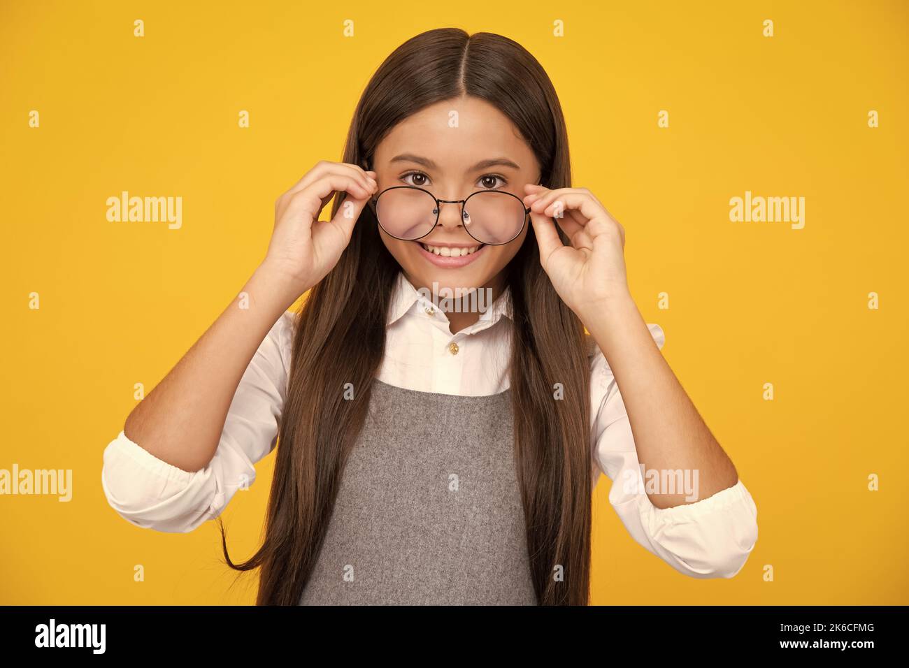 Happy girl face, positive and smiling emotions. Ophthalmologist tries ...