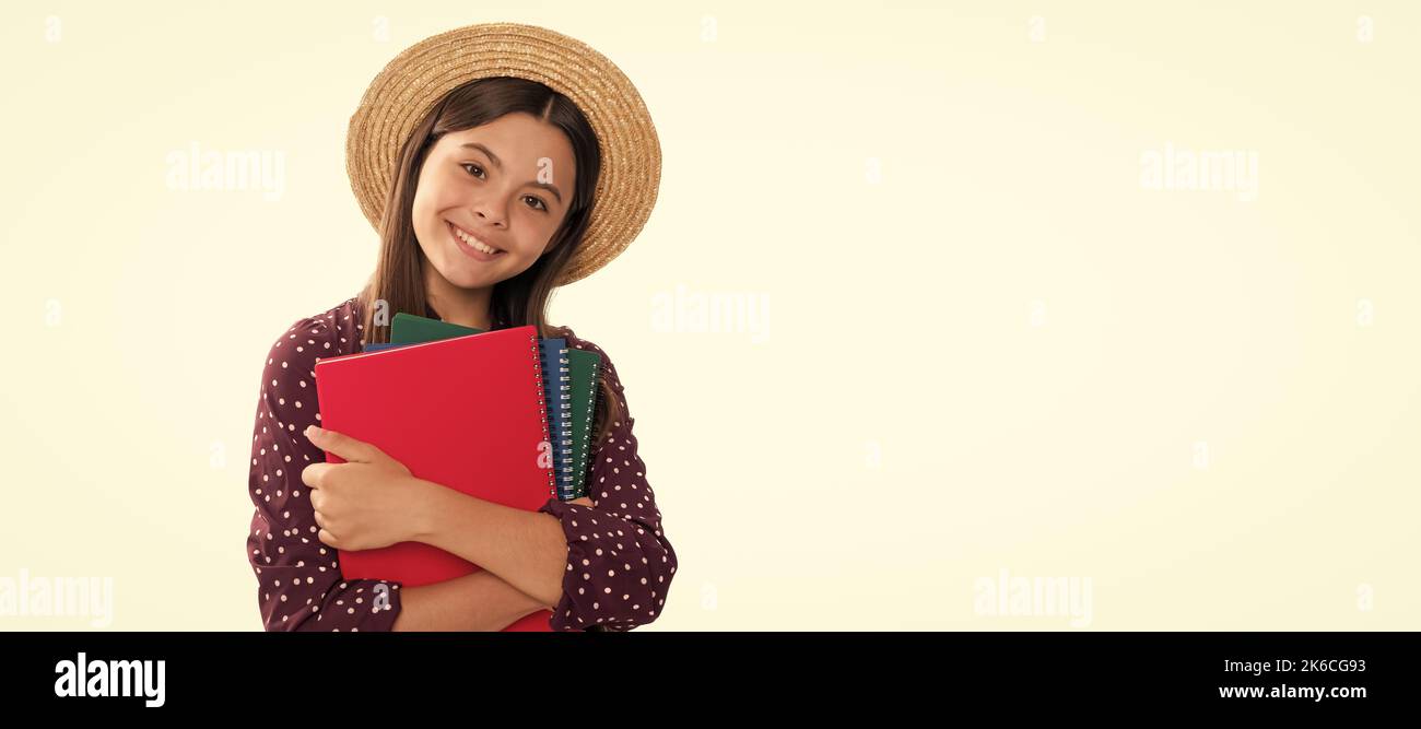 Summer school. happy cute teen girl in straw hat hold school workbook ...