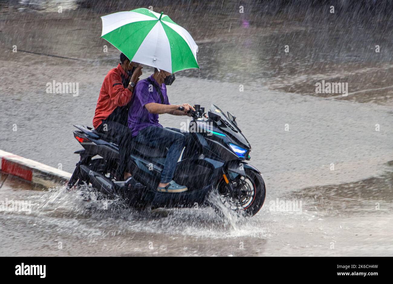 Motorbike Riding In Rain