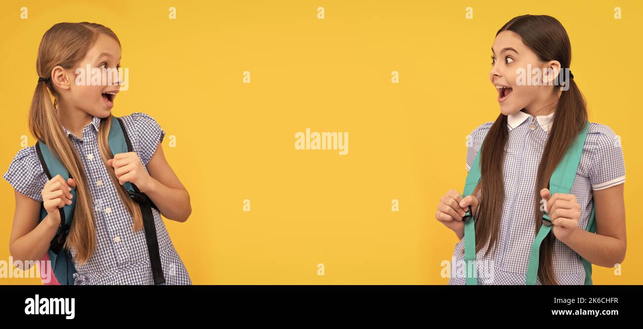 School girls friends. Surprised school friends on September 1 yellow ...