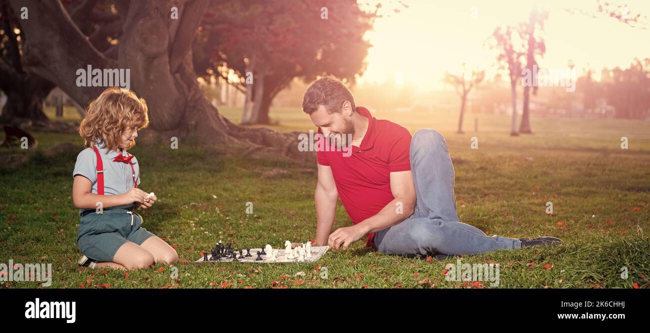 Banner of dad and child play chess logic game. father and son playing ...
