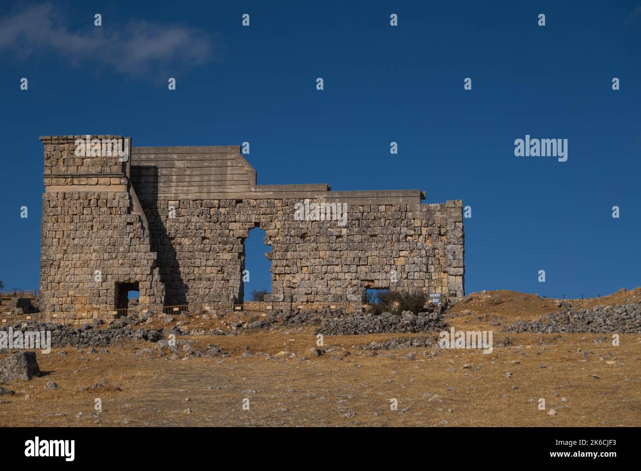view of the main facade of the roman theater of Acinipo in Ronda,Malaga ...