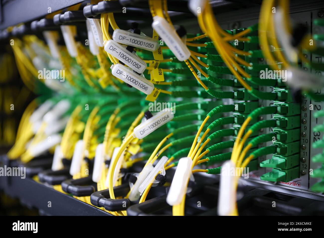 13 October 2022, Saxony, Taucha: Fiber optic cables are installed in ...