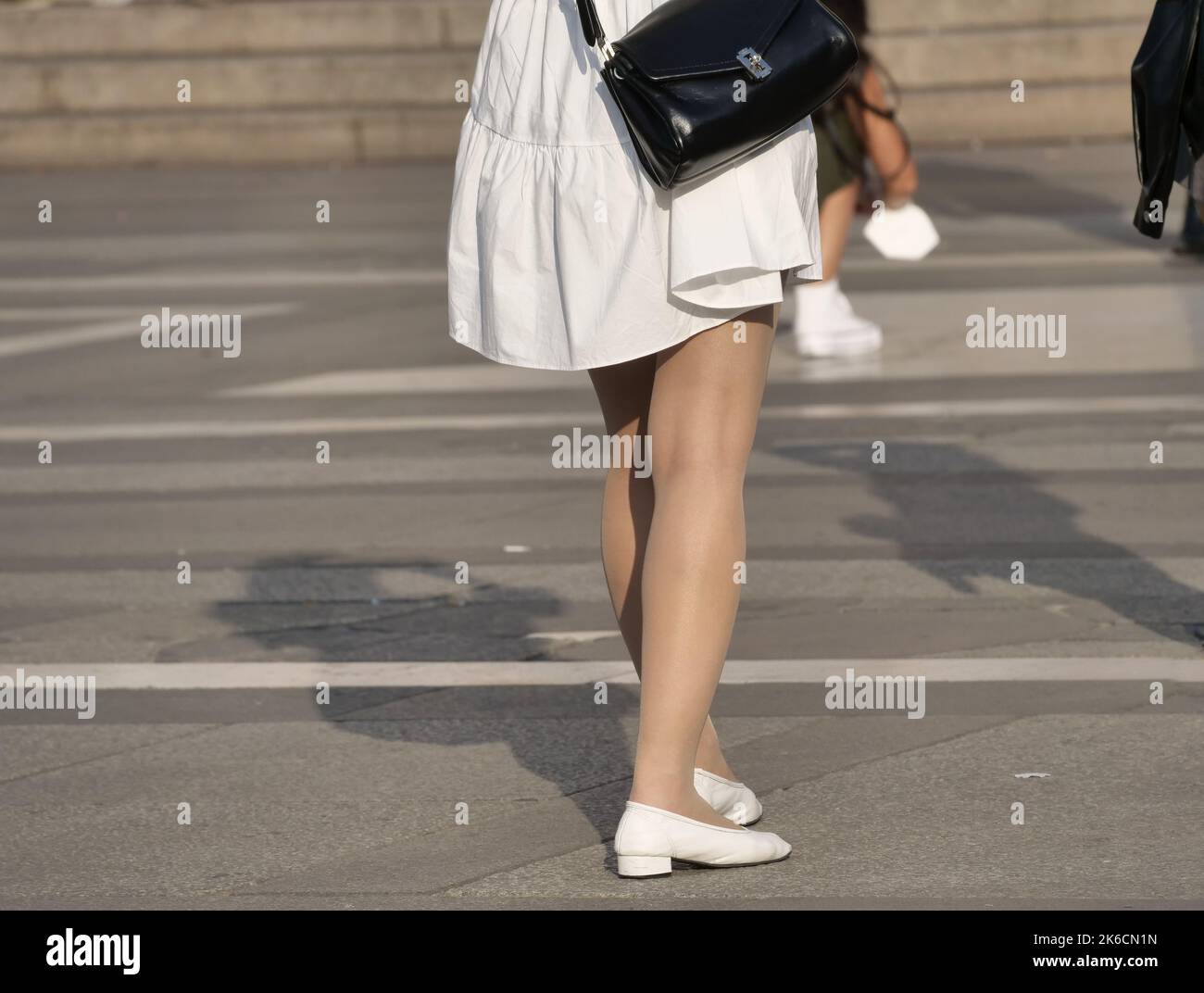 Girl in miniskirt and tan pantyhose in Duomo square, Milan, Lombardy ...