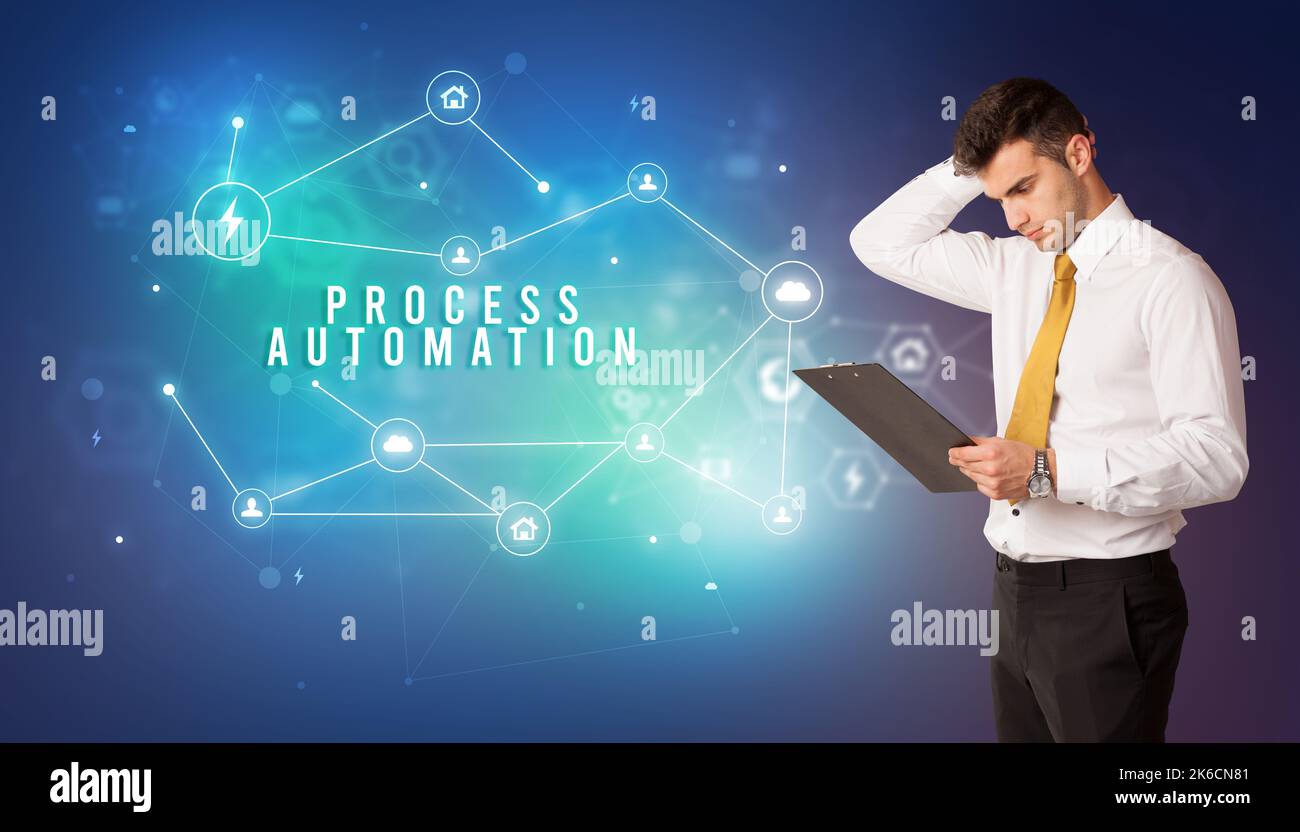Businessman thinking about technology concept Stock Photo - Alamy
