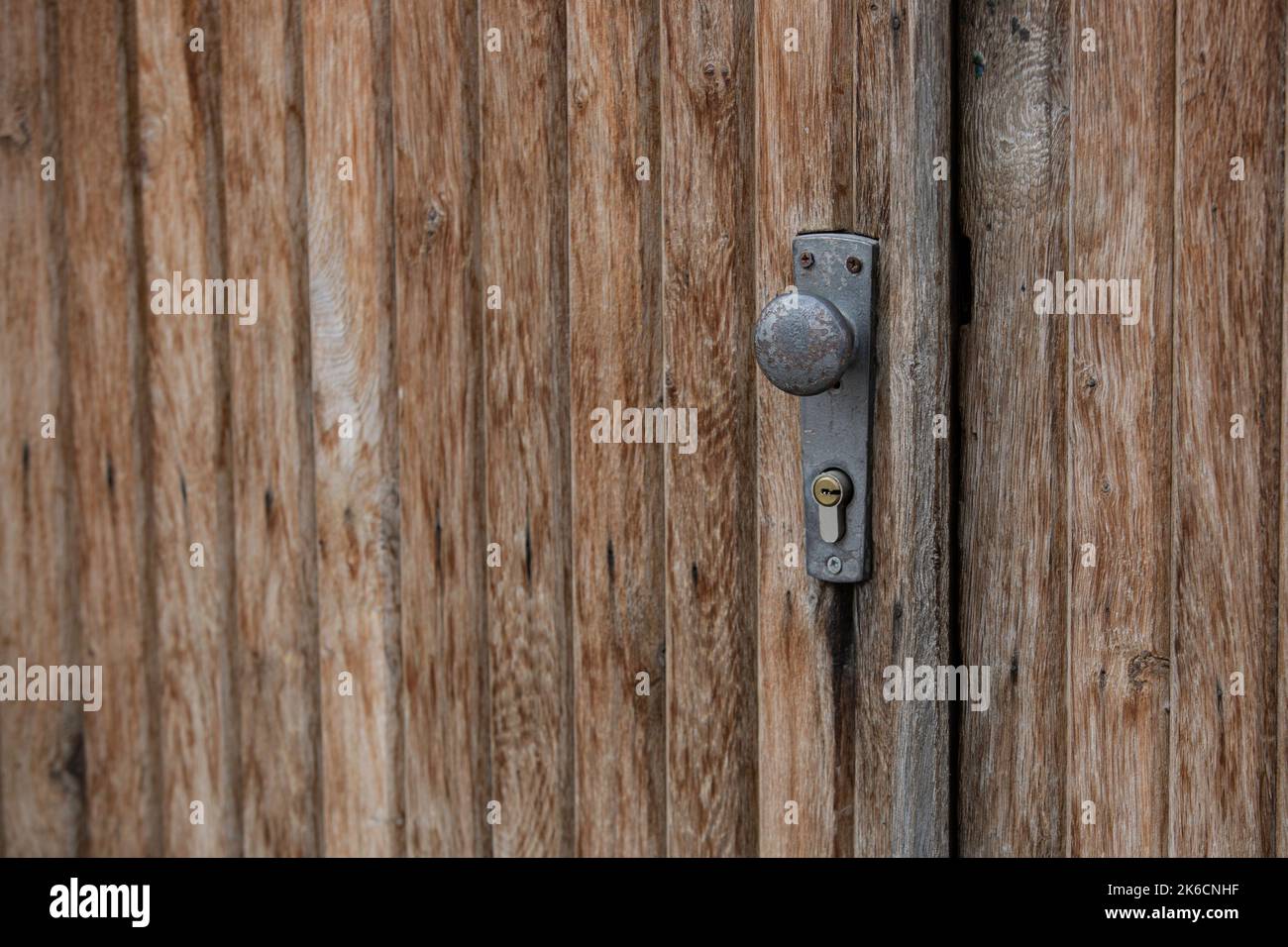old wooden door with lock Stock Photo - Alamy