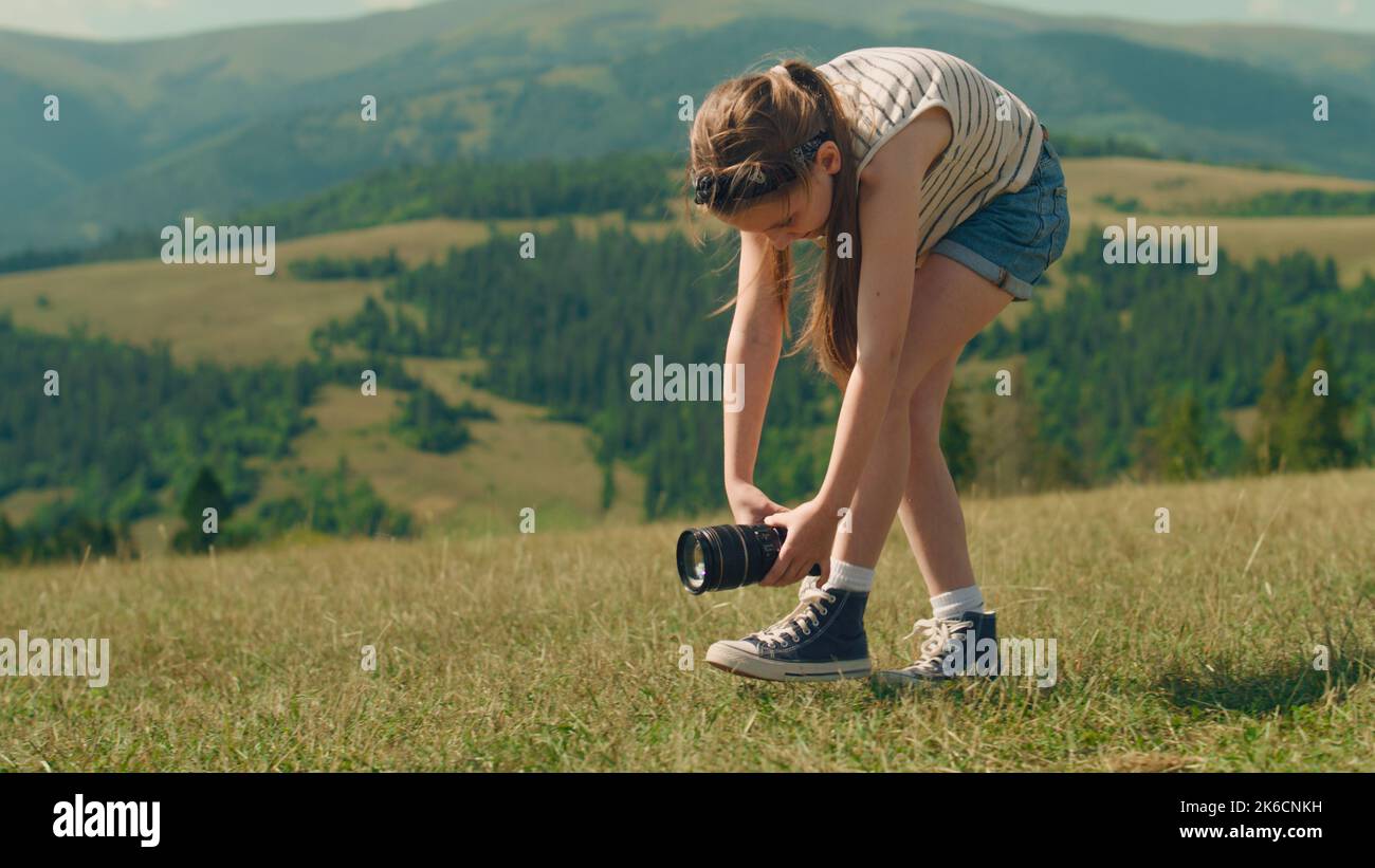 Young photographer filming beautiful movie. Girl creating content in ...