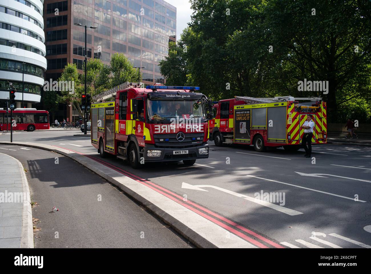 London Fire Brigade engines wait at Westminster Bridge as part of the ...